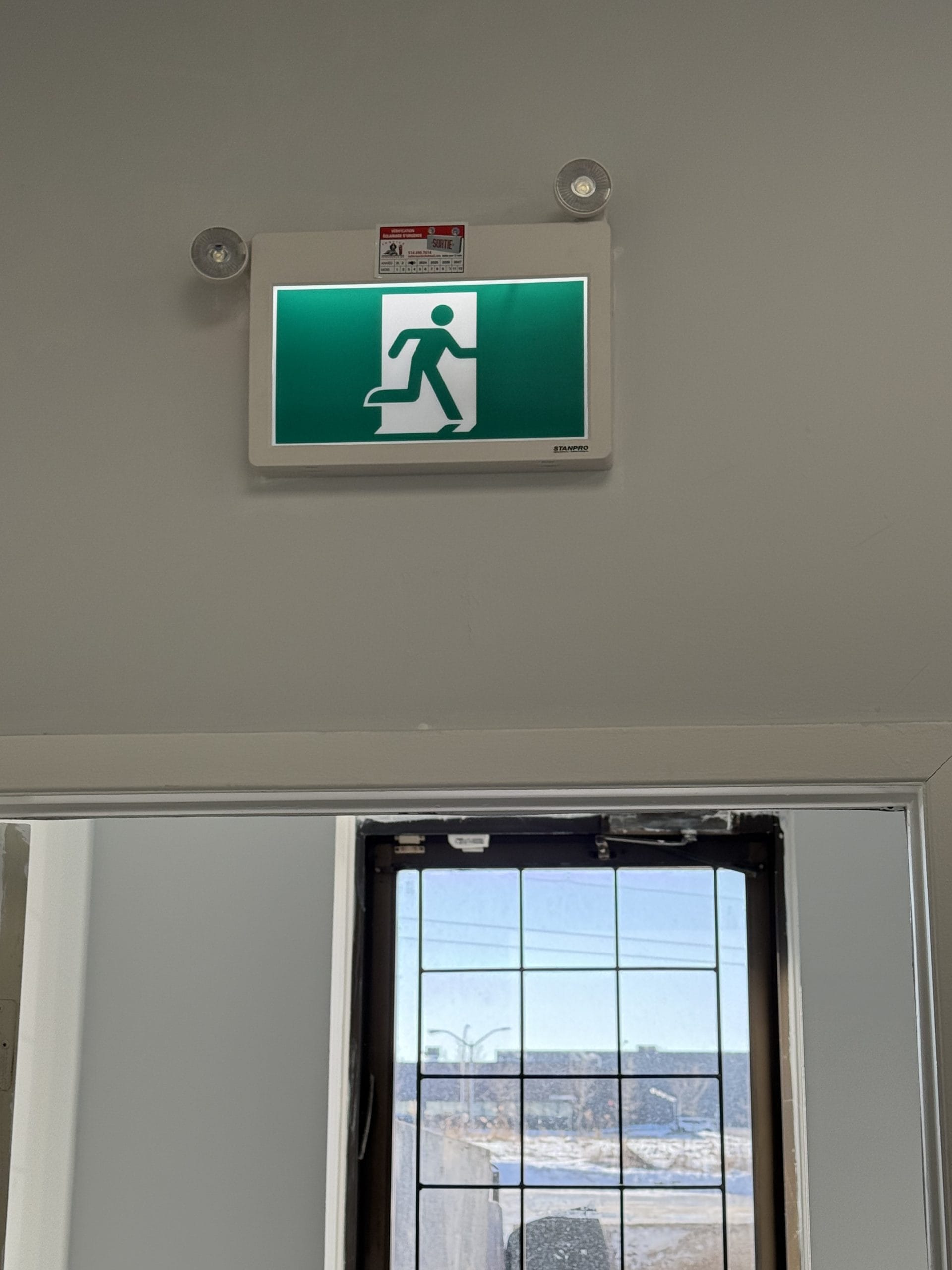 Running Man Exit Sign